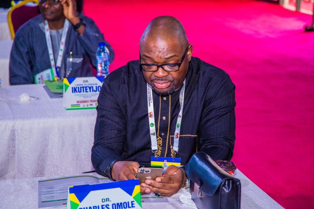 About Charles Omole - Dr. Charles Omole